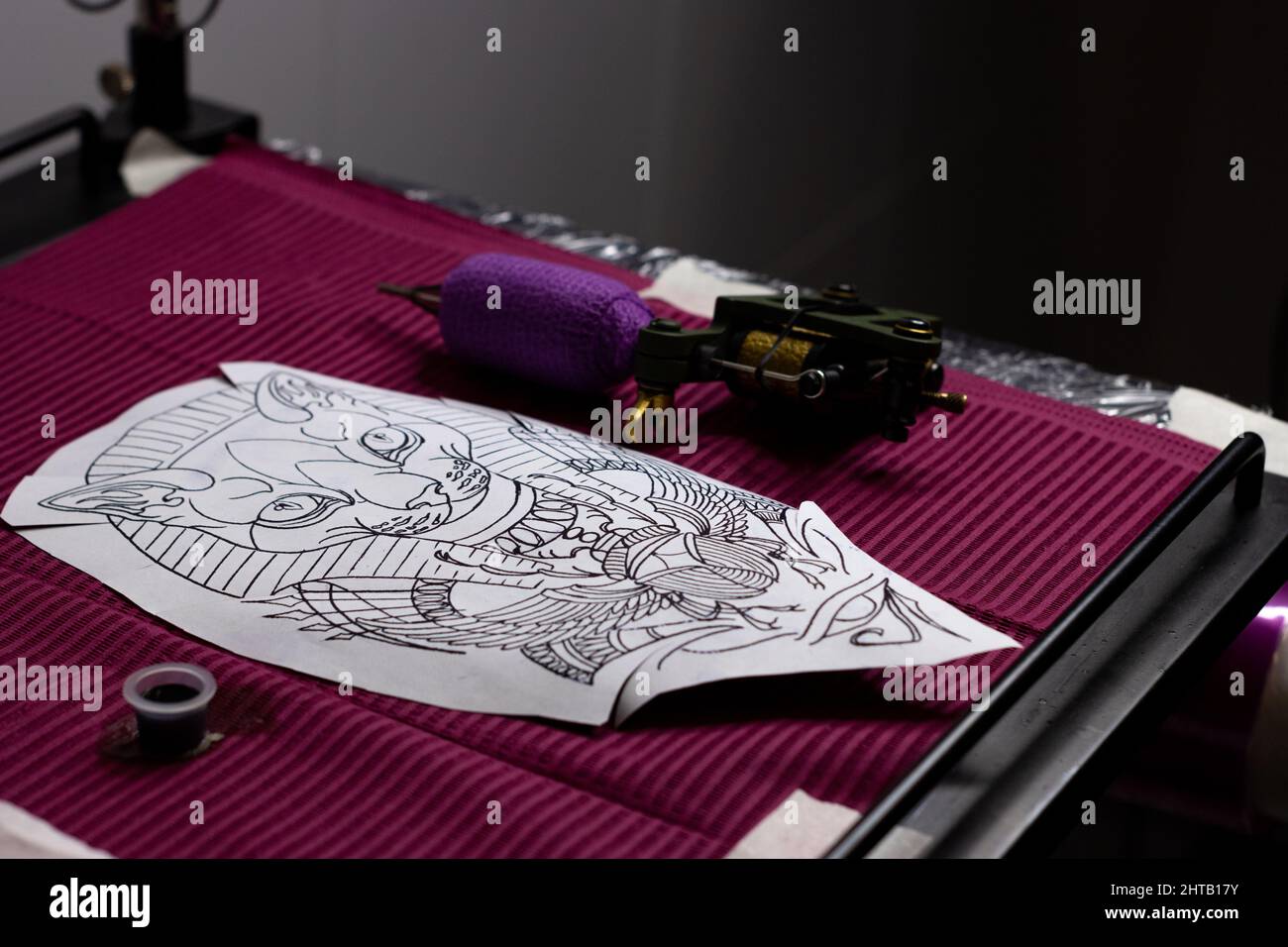 Top view of Tattoo table with the sketch for tattooing tattoo machine ...
