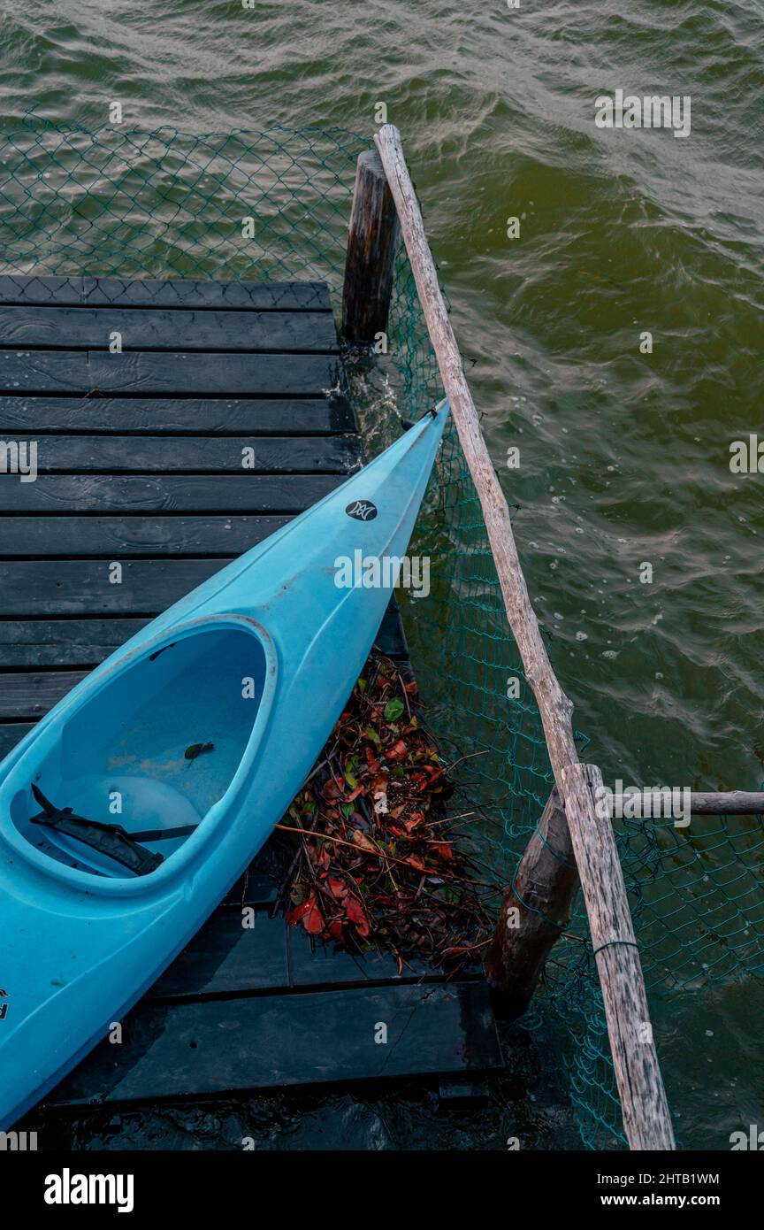 Closeup of a blue kayak on the boardwalk in Cancun, Mexico Stock Photo ...