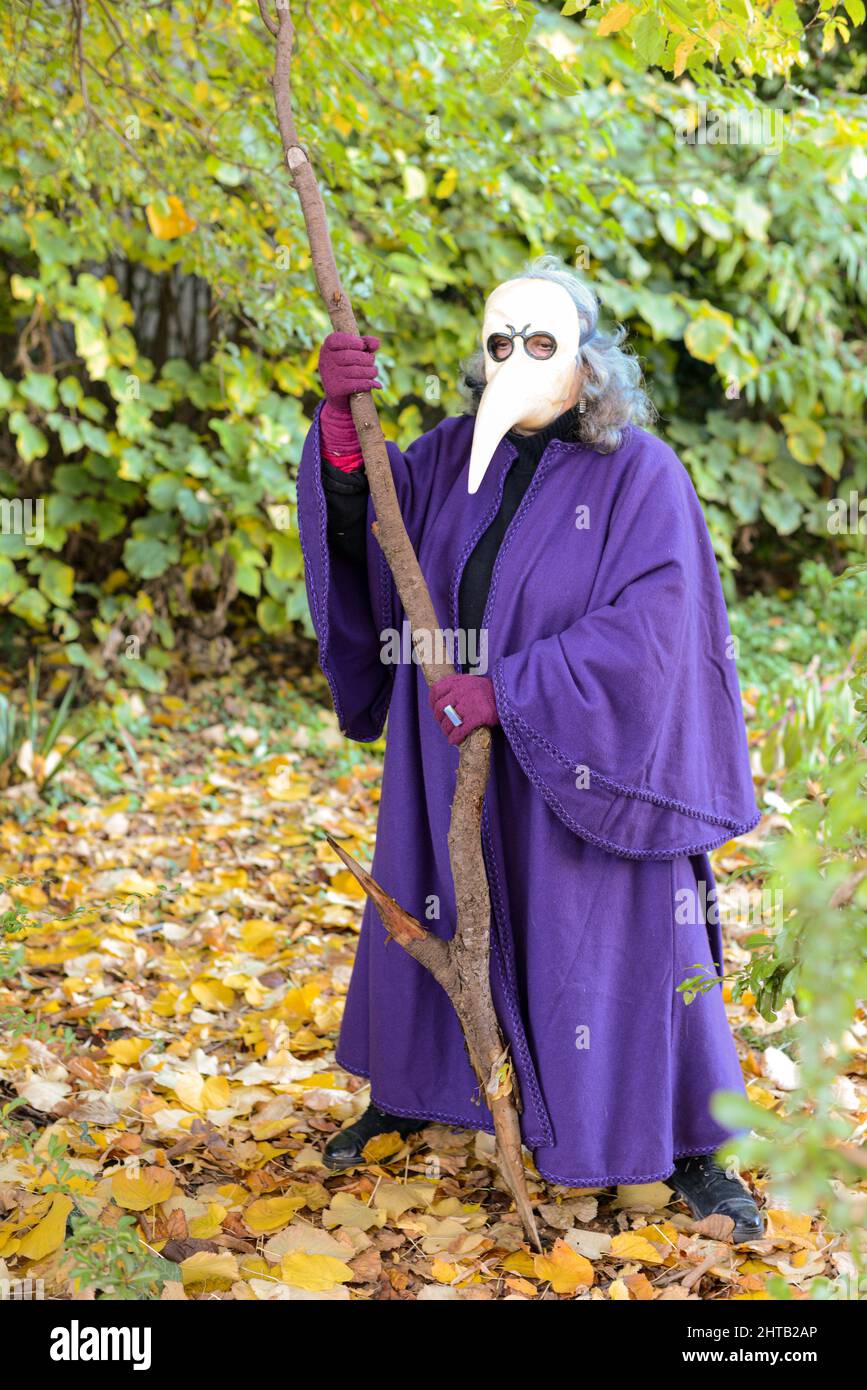 A mid-aged actor playing an evil theather character Stock Photo - Alamy