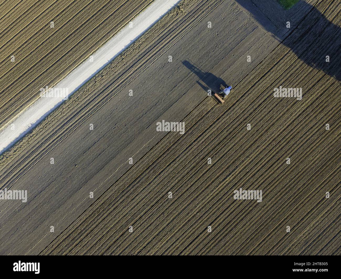 Abstract aerial view tractor harvesting hi-res stock photography and ...