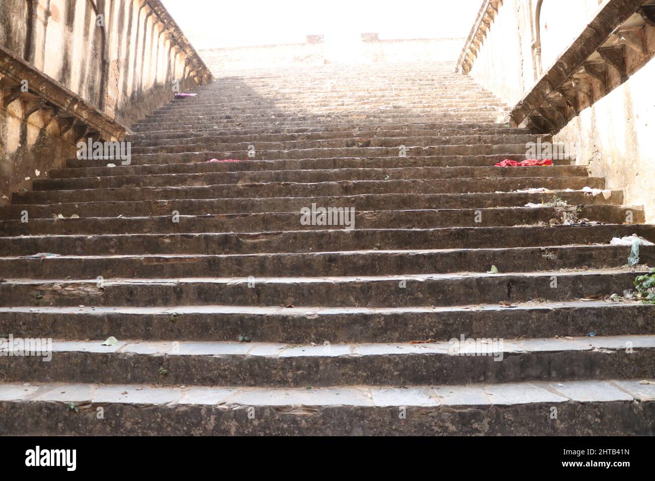old steps in step well Stock Photo - Alamy