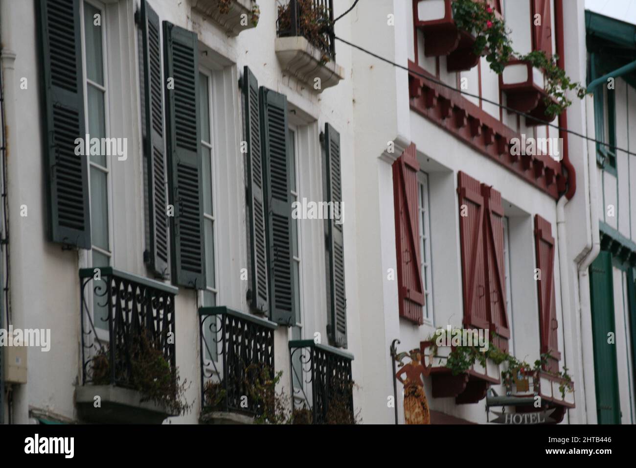 A beautiful old-style house with colorful windows in Hondarribia ...