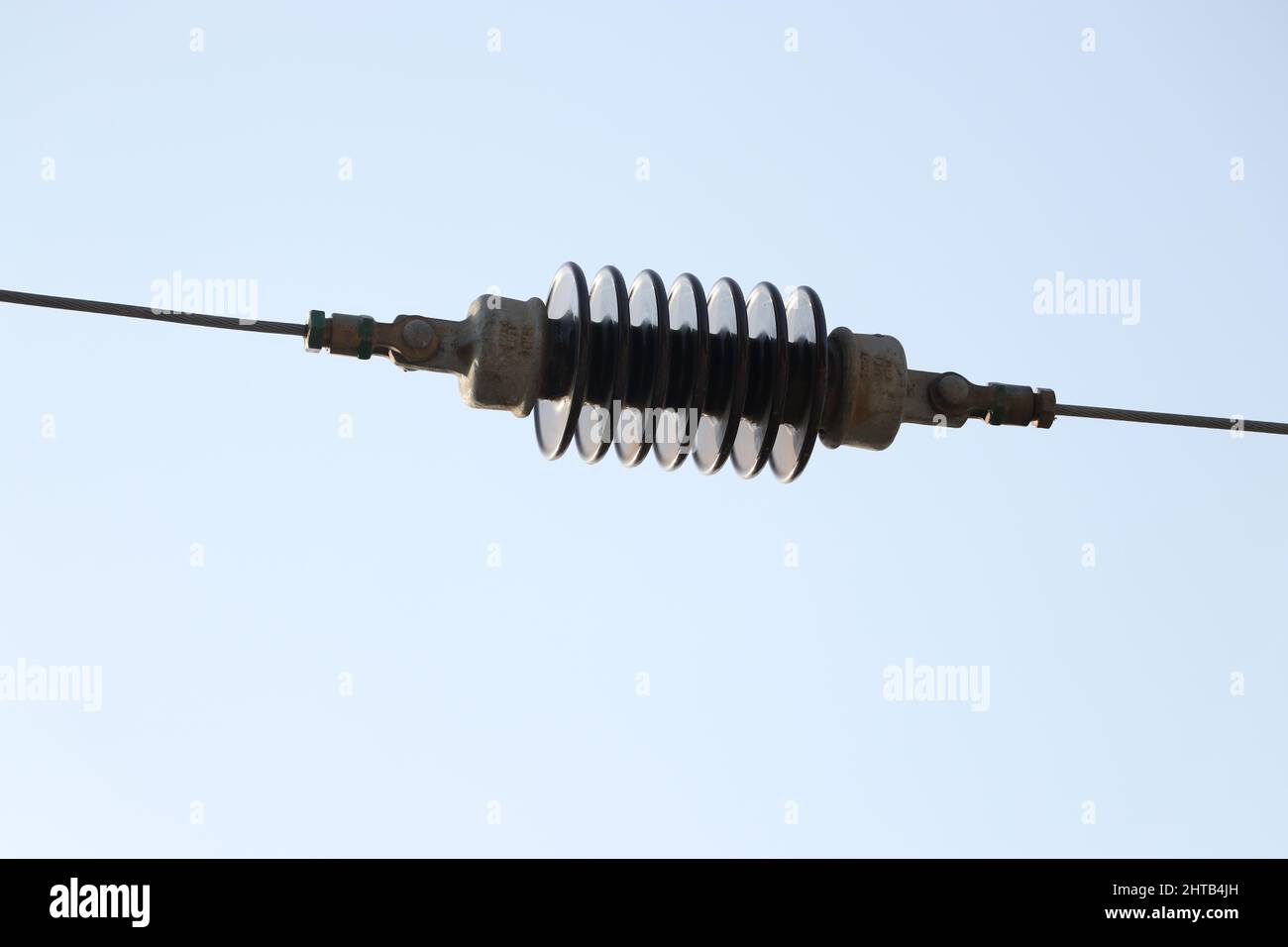 electric power cable joint on isolated background Stock Photo - Alamy