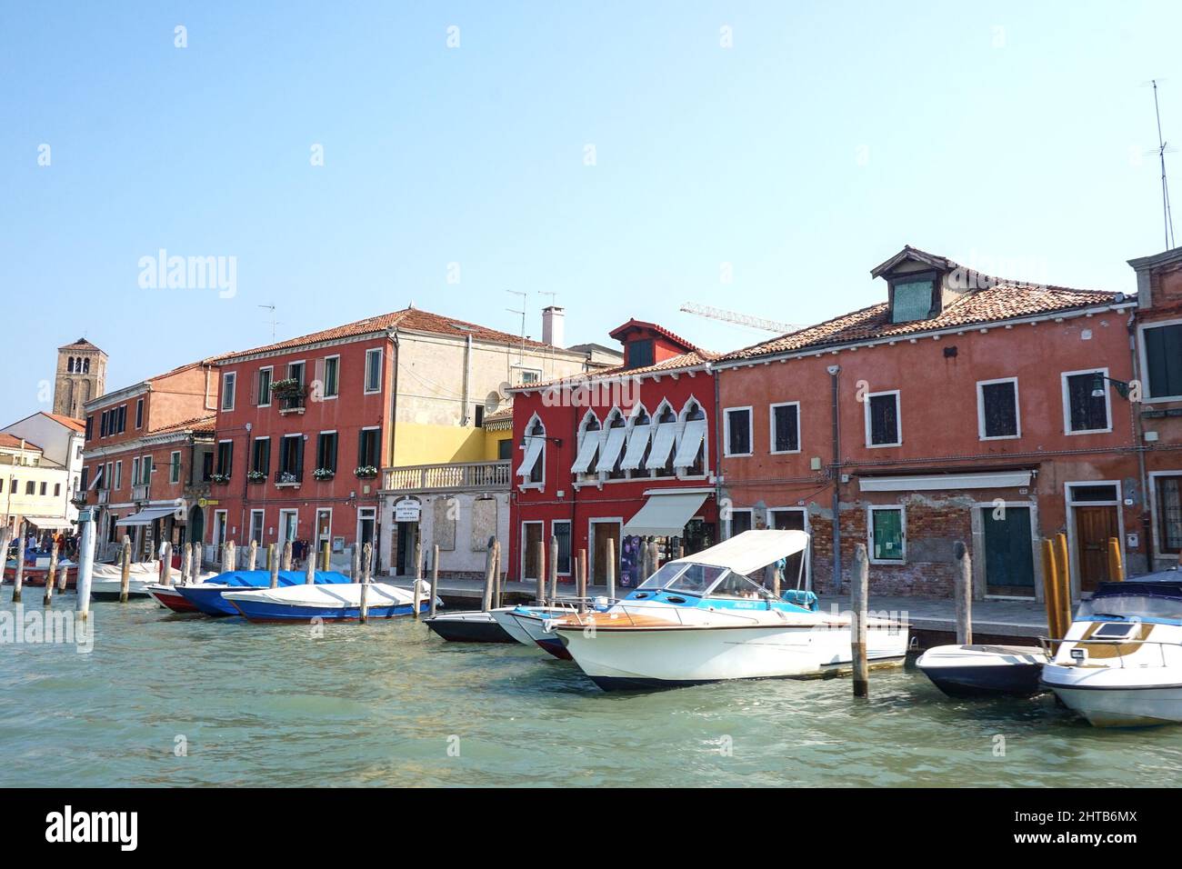 Beautiful view on the canal with boat and motorboat in the water in ...