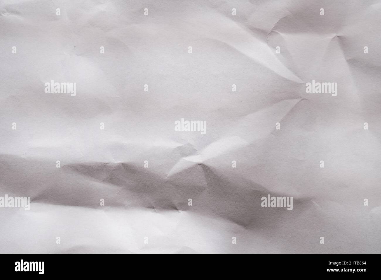 Crumpled white blank paper background Stock Photo - Alamy