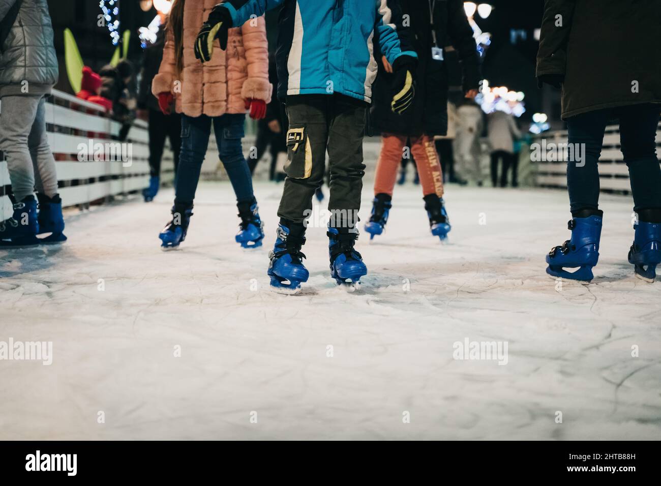 Ice rink with skating people Stock Photo - Alamy