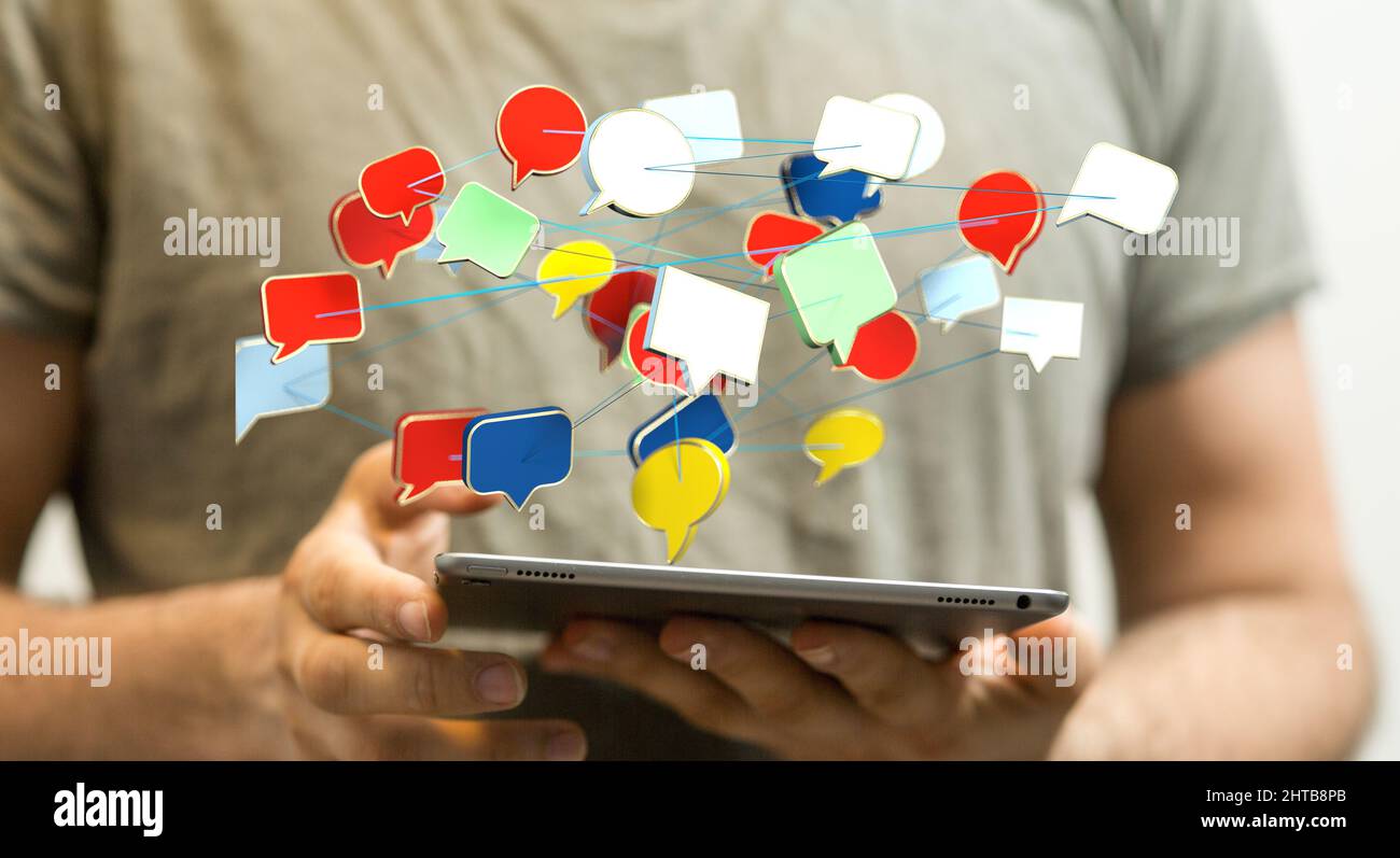 3D rendering of colorful messaging icons floating with a man holding a ...