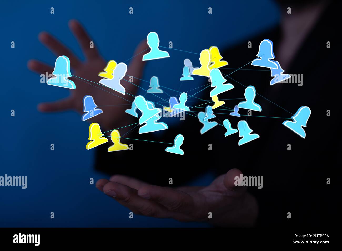 Person presenting a virtual projection of human network Stock Photo - Alamy