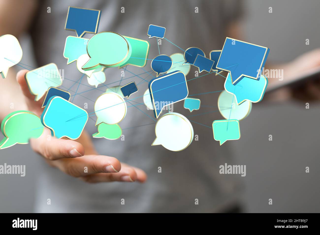 Shallow focus shot of a human hand holding colorful chat bubbles ...
