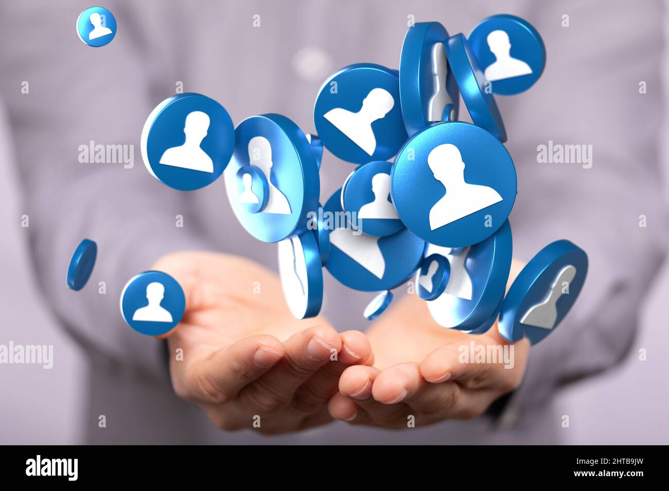 Shallow focus shot of human hands holding human icons - networking ...