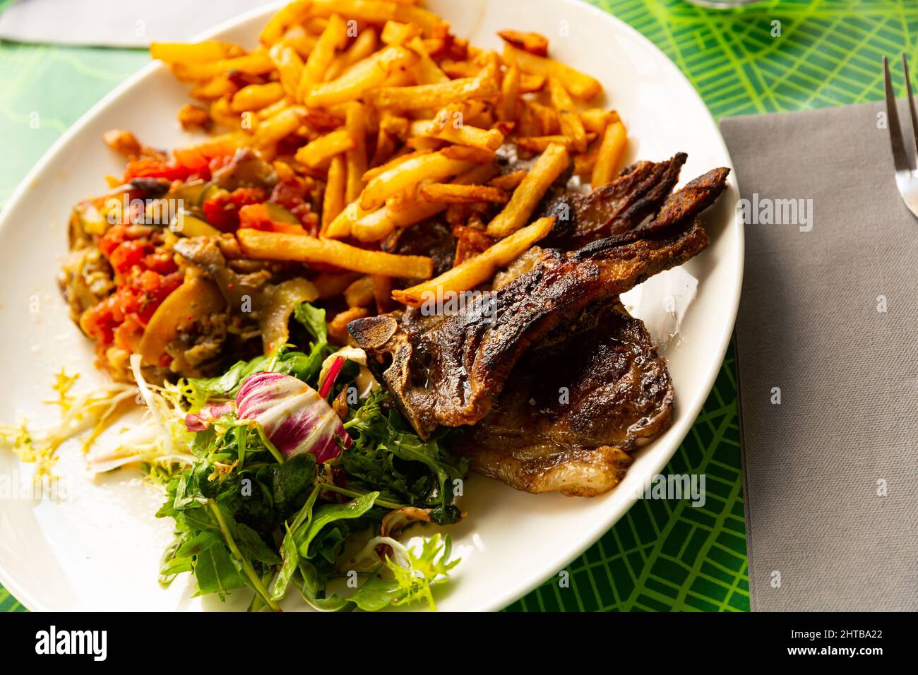 French dish, grilled lamb ribs Stock Photo - Alamy