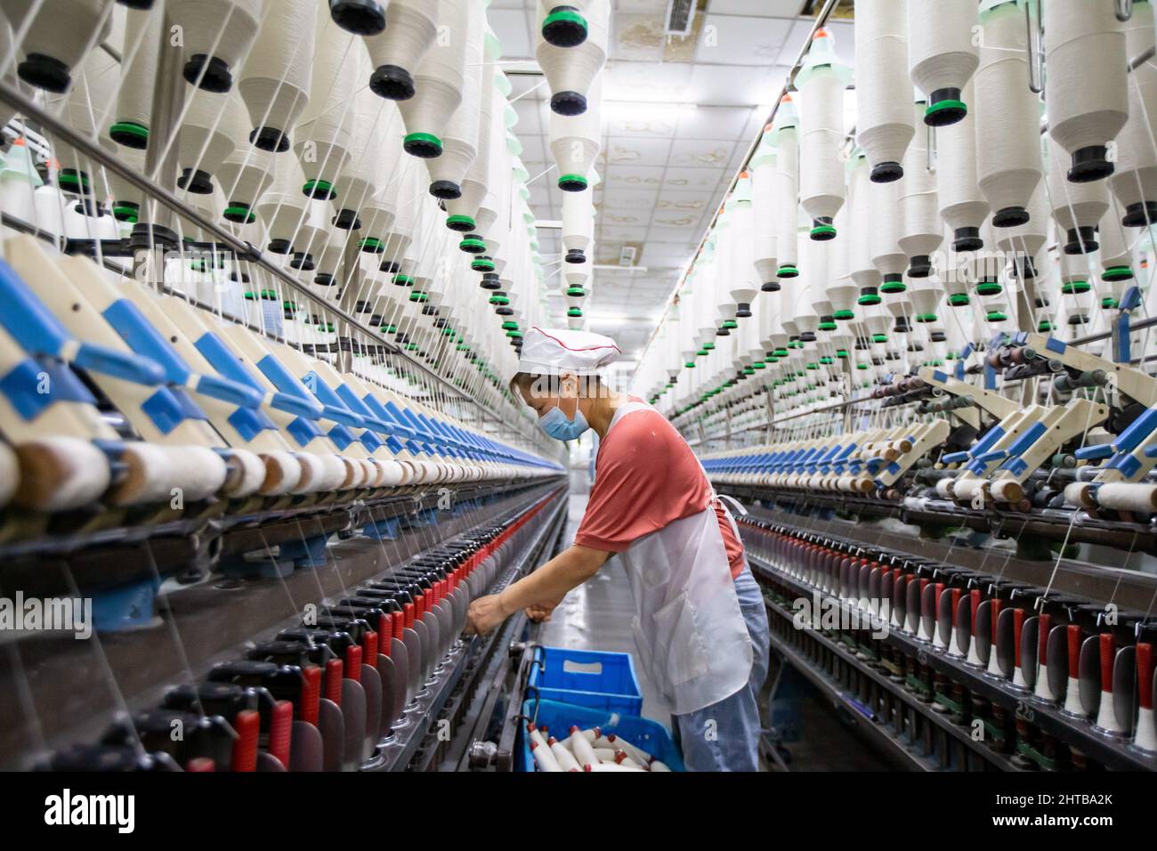 HAIAN, CHINA - FEBRUARY 28, 2022 - A worker works on a production line ...