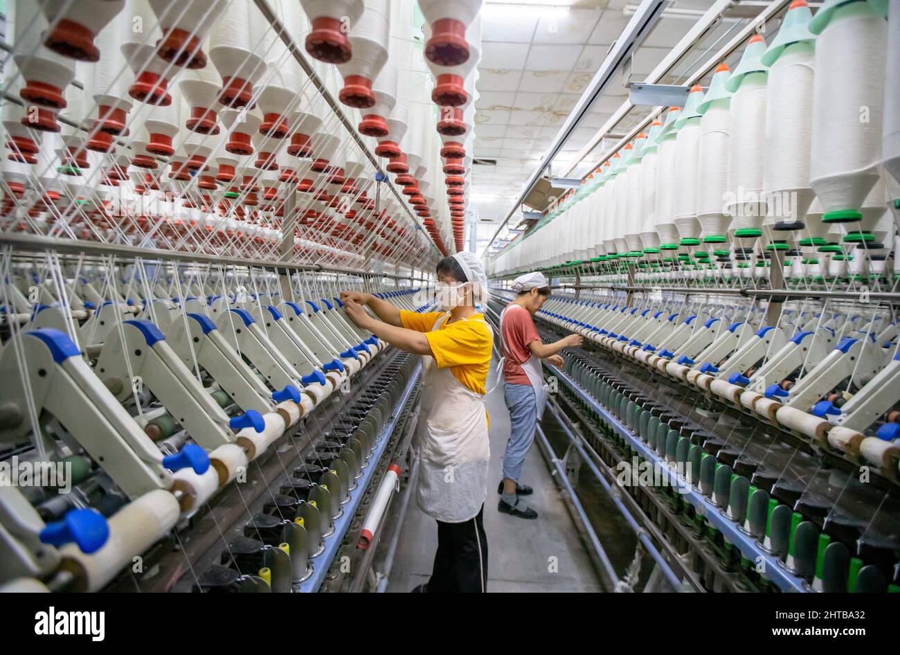 HAIAN, CHINA - FEBRUARY 28, 2022 - A worker works on a production line ...