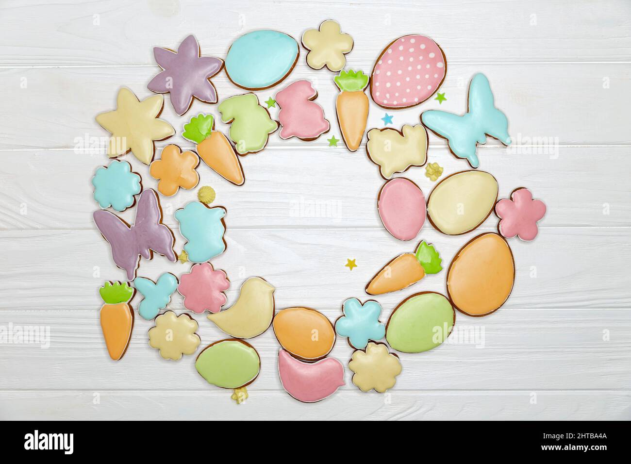 Selection of colourful glazed biscuits on a white background Stock ...