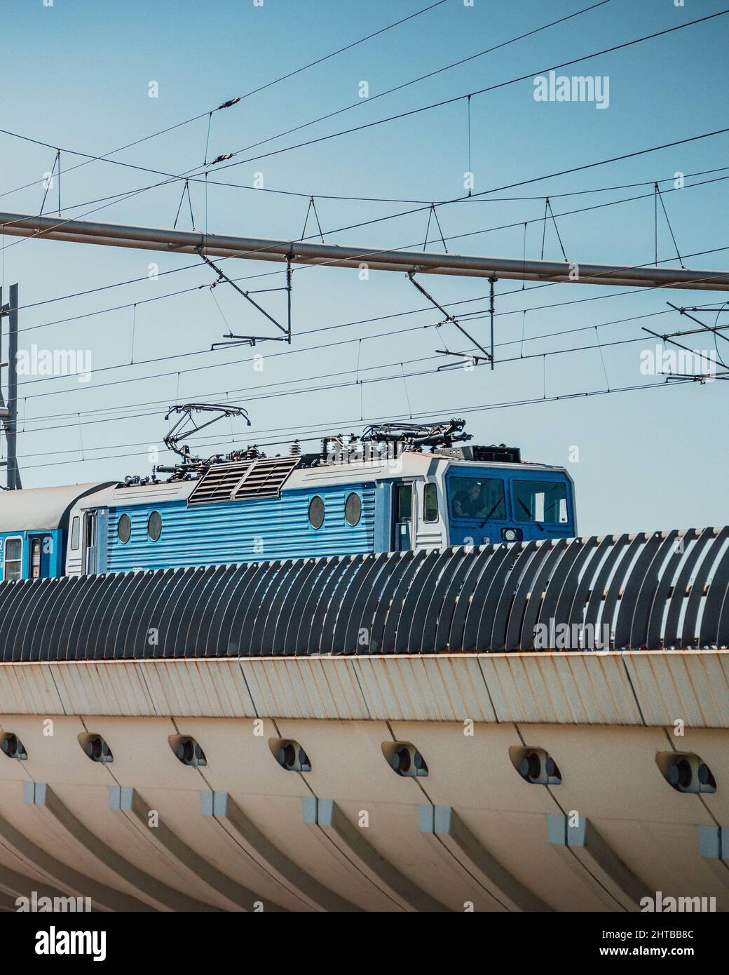 Blue tram on railway Stock Photo - Alamy