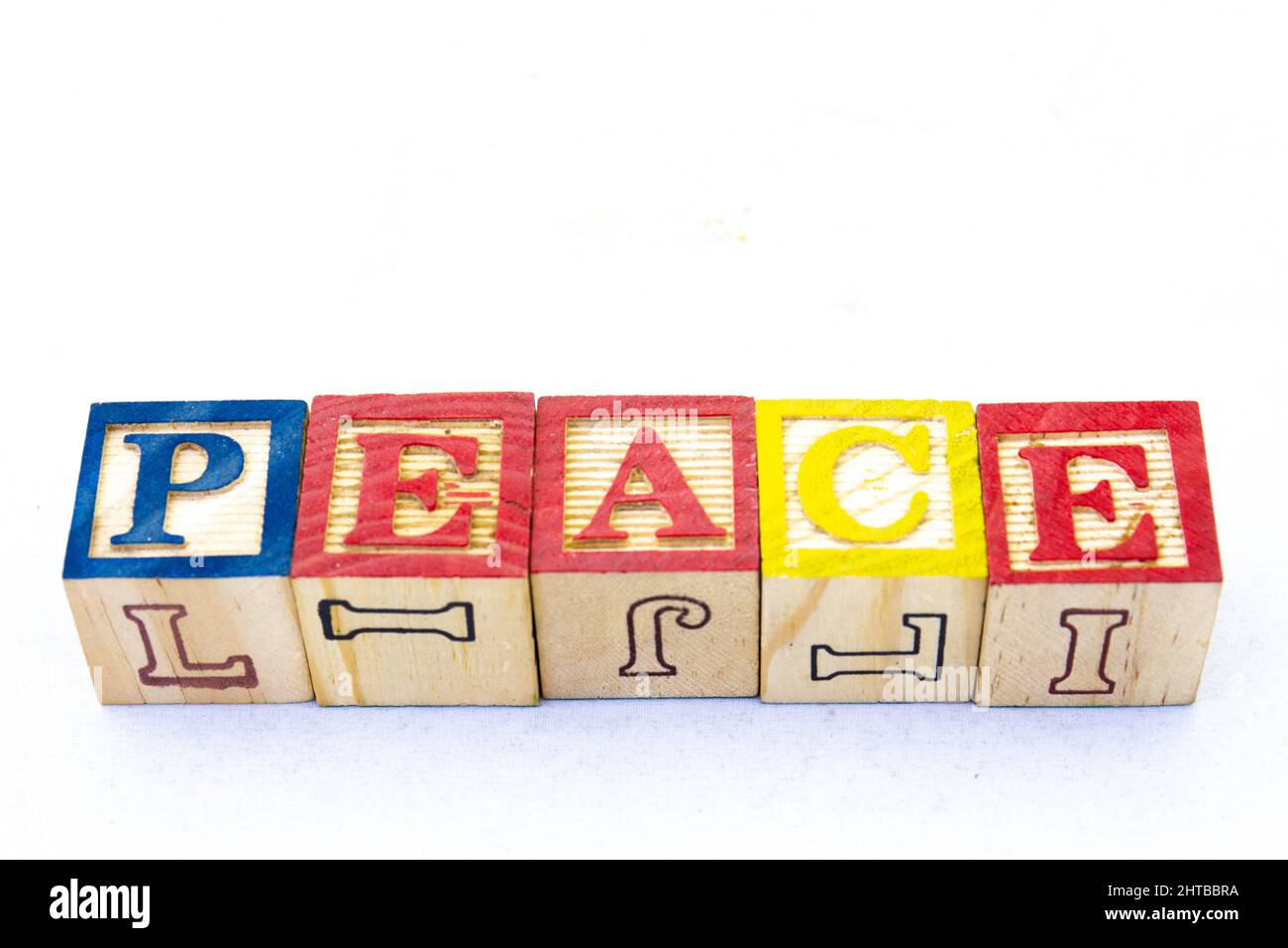 The term PEACE displayed visually on a clear background with copy space ...