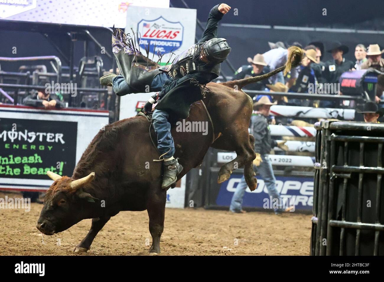 Nineteen year-old Bob Mitchell rides a bull during the PBR Pluto TV Invitational at the Crypto ...