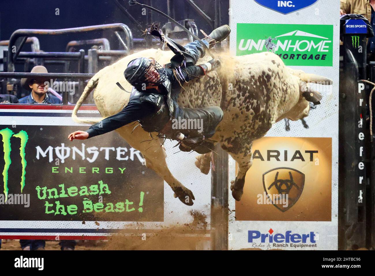 Nineteen year-old Bob Mitchell is thrown from a bull during the PBR ...
