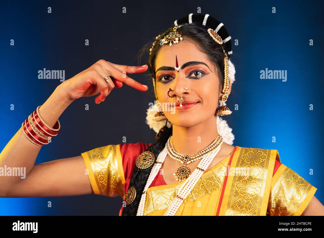 Close up shot of bharatanatyam dancer doing eye moments or drishti ...