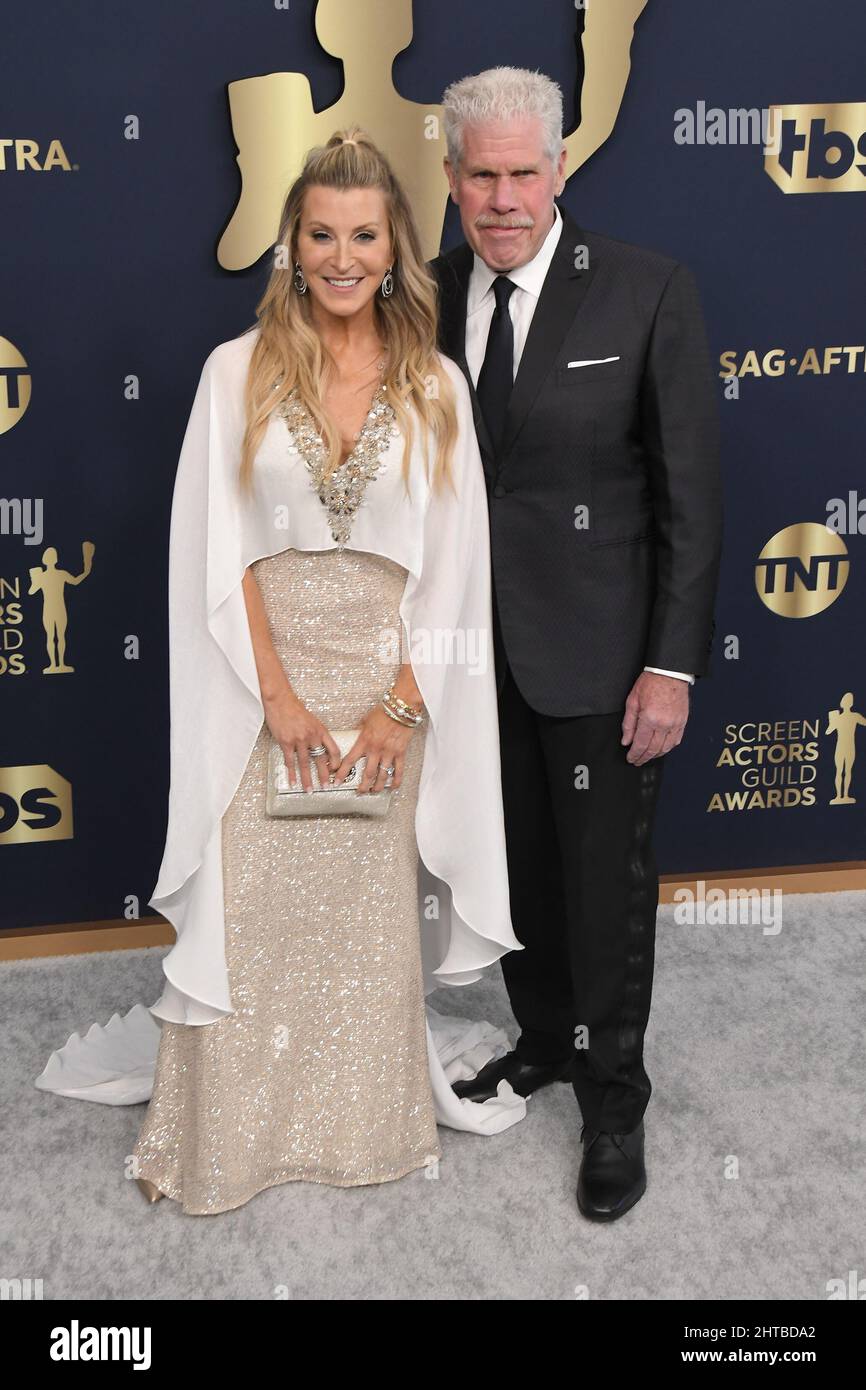 Los Angeles, USA. 27th Feb, 2022. Allison Dunbar and Ron Perlman arrive ...