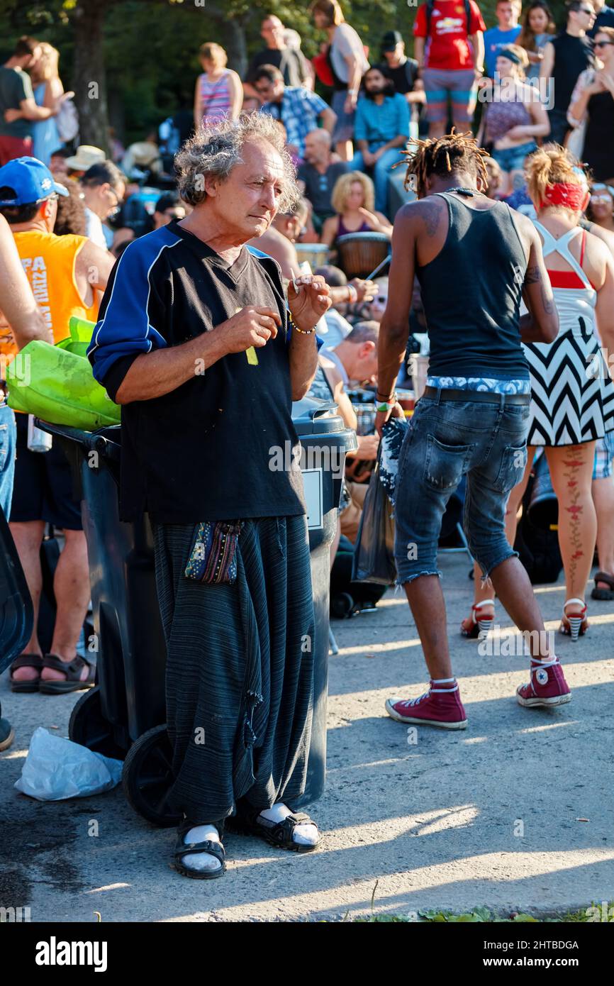 Montreal, Canada - June 2018: A monk smoking marijuana in the crowd in ...
