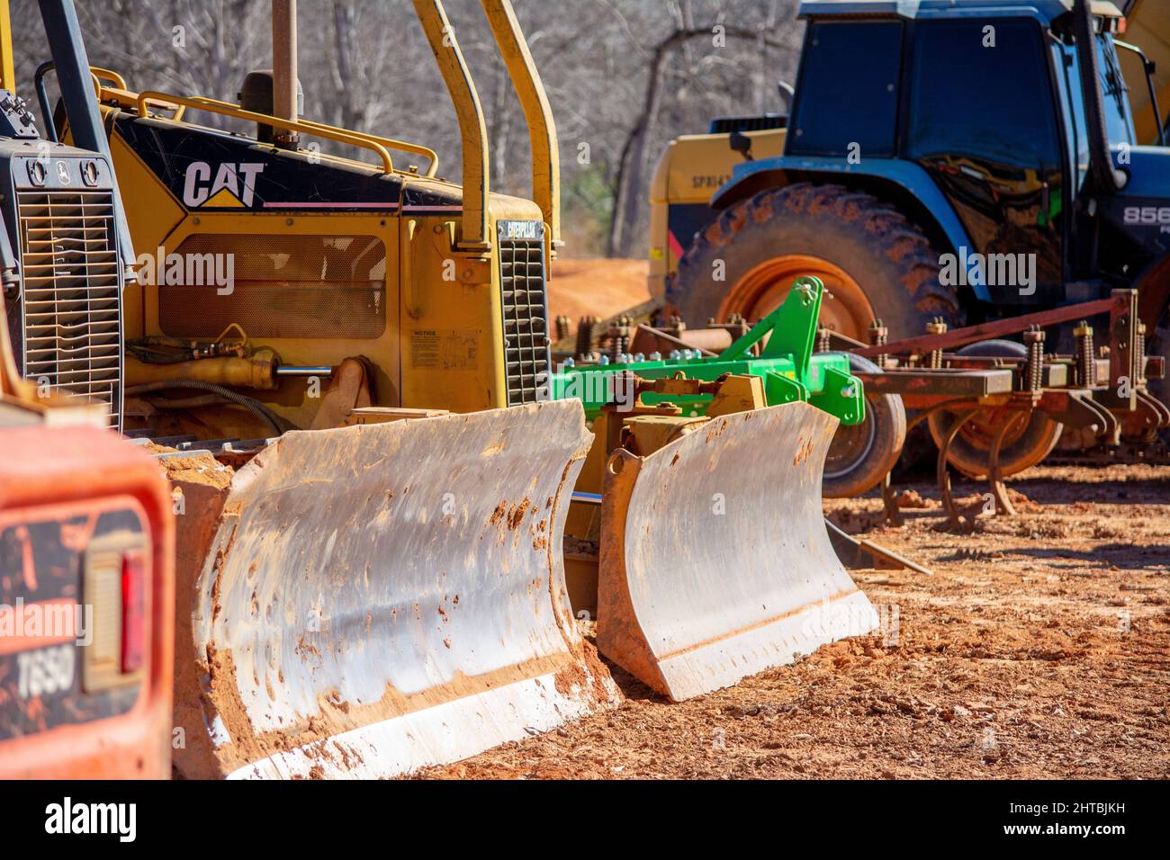 View of CAT bulldozers at a motocross track in Charlotte, United States ...