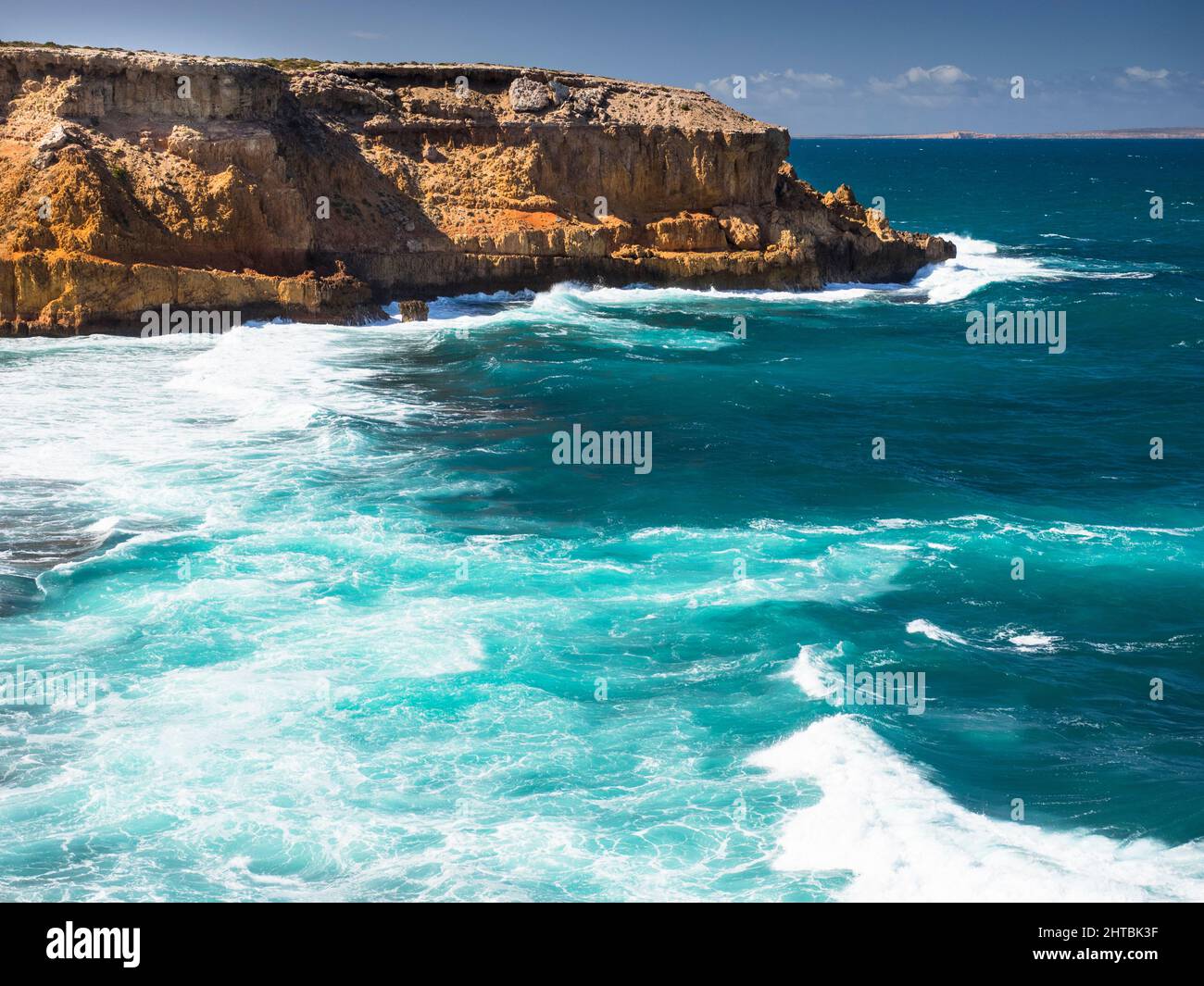 Rough seas below the cliffs at Cape Bauer overlooking the Southern ...