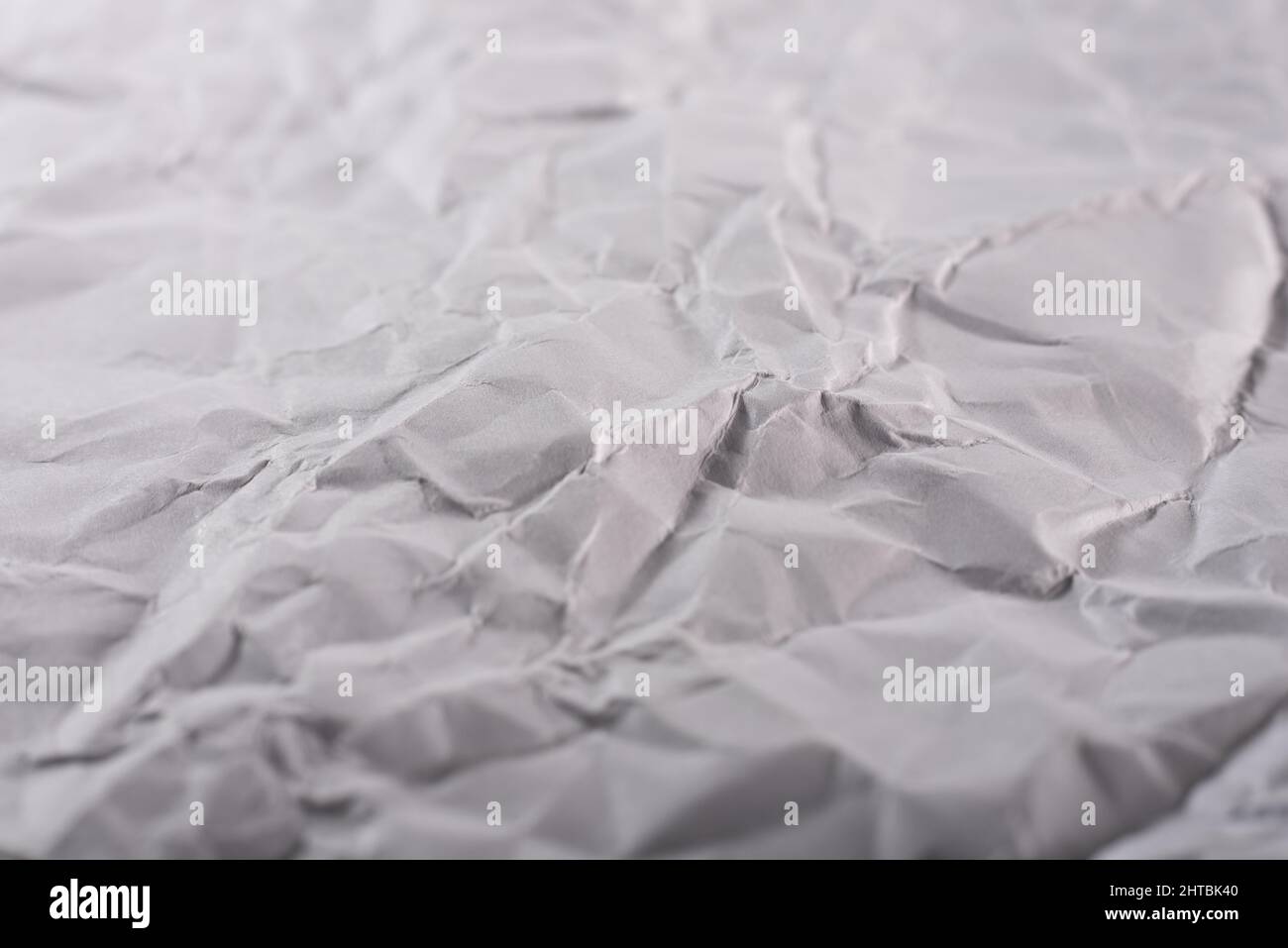Closeup shot of a white crumpled paper Stock Photo - Alamy