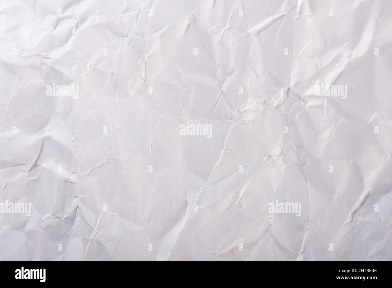 Closeup shot of a white crumpled paper Stock Photo - Alamy