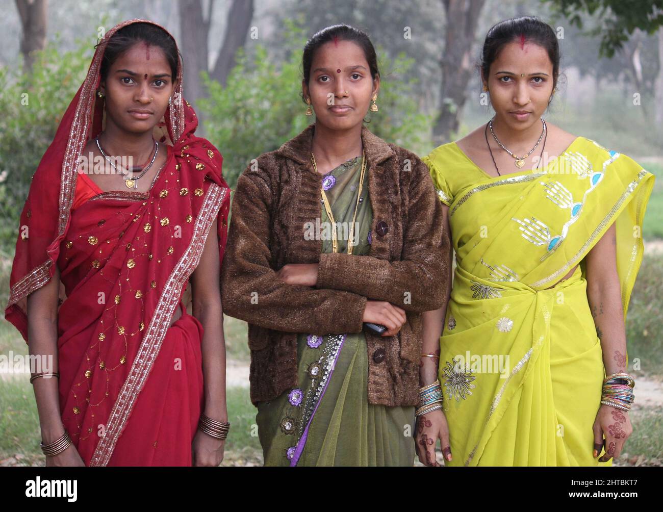 Portrait of three young Indian girls in the garden Stock Photo - Alamy