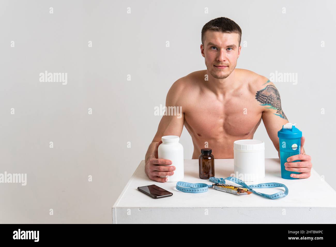 Fitness protein jars white on white background bodybuilder powder ...