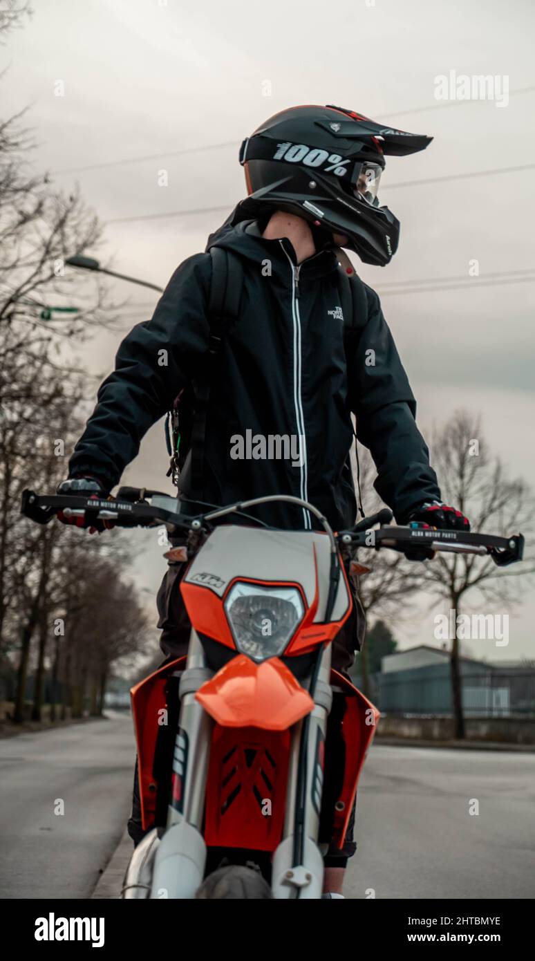 Person riding an orange KTM Motard motorcycle Stock Photo - Alamy