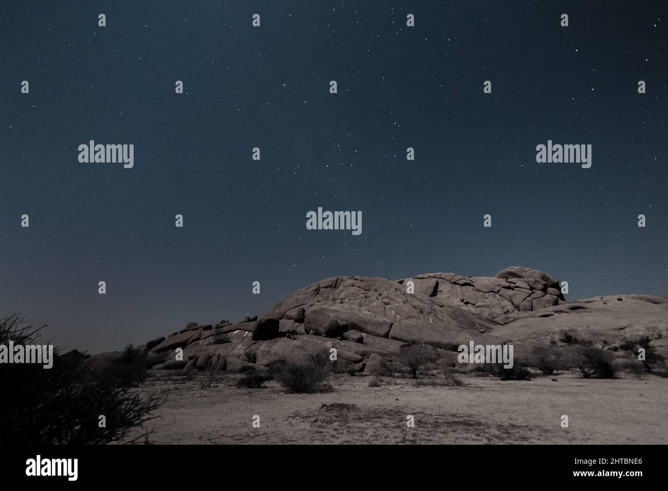 Night shot of the Namibian Desert near Spitzkoppe, under a clear starry ...