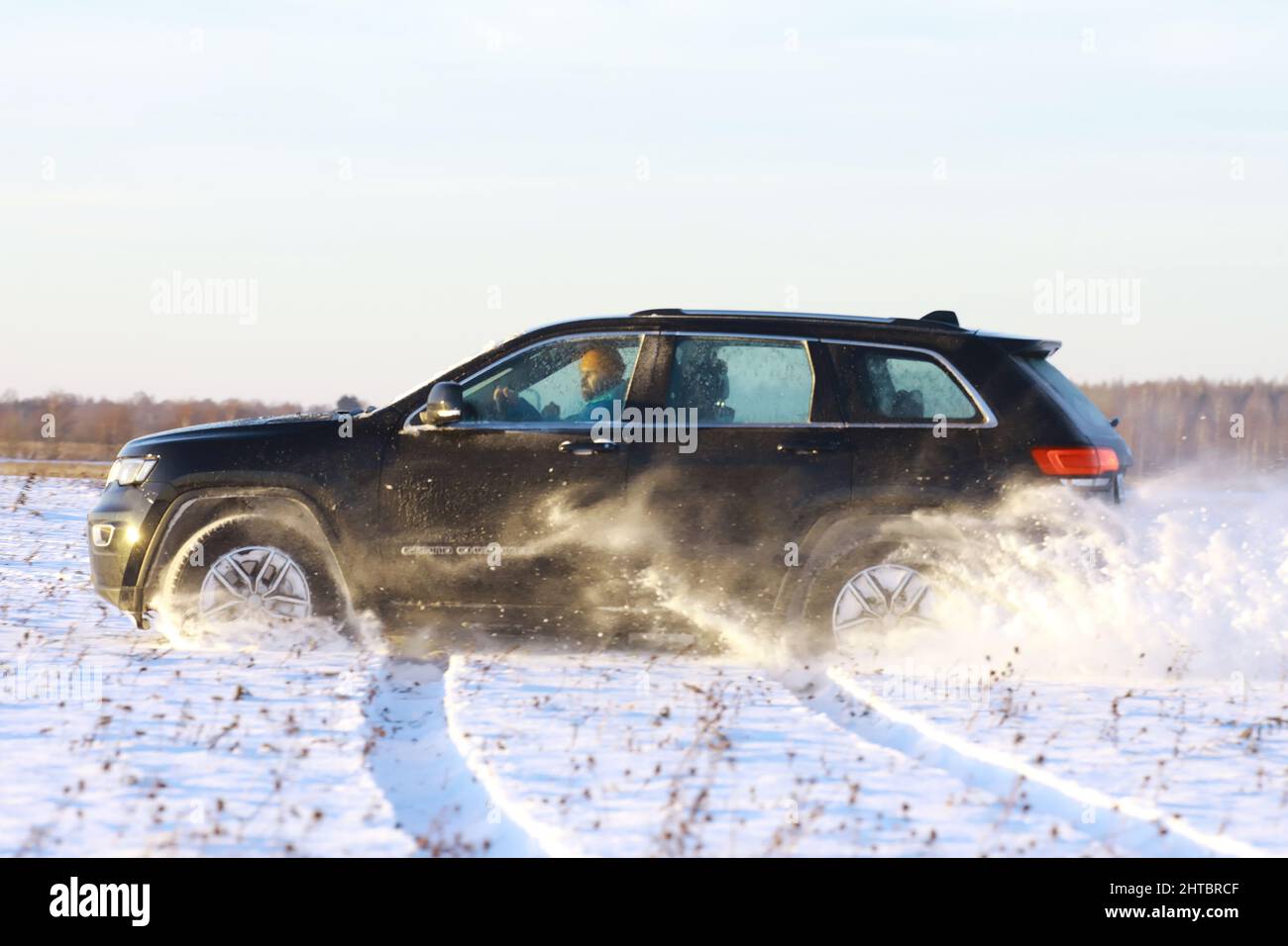 Car in the field winter. Off-road winter snow drifts. Extreme sport ...