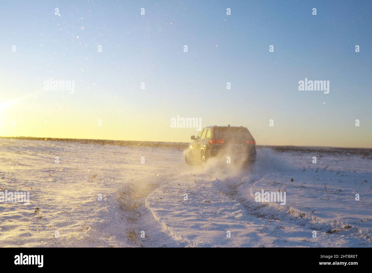 Car in the field winter. Off-road winter snow drifts. Extreme sport ...
