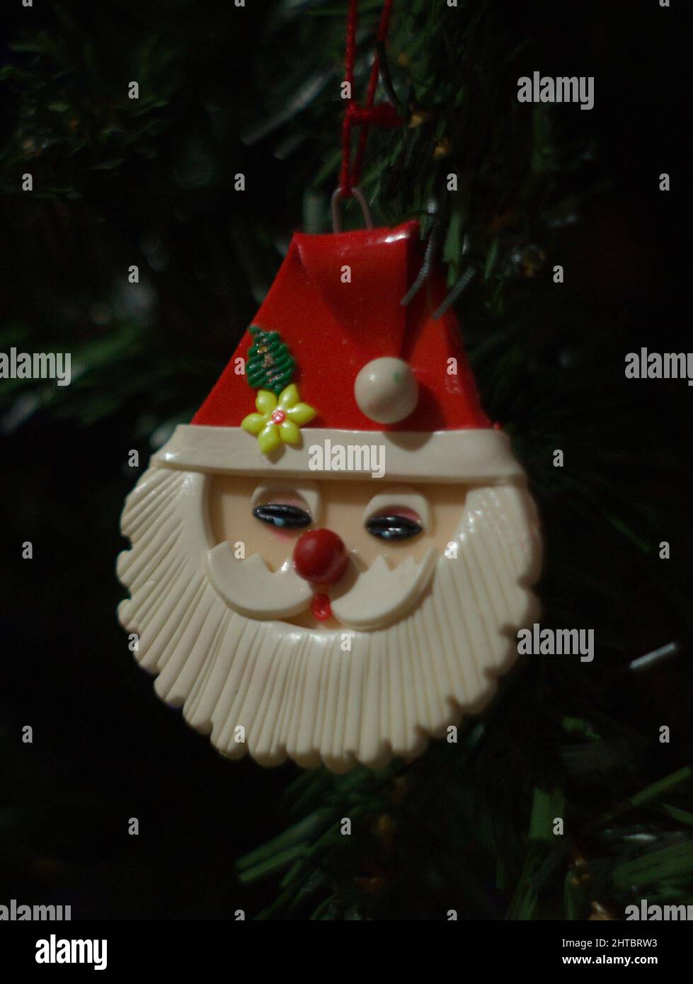 Closeup of a christmas decoration santa claus on a tree Stock Photo - Alamy