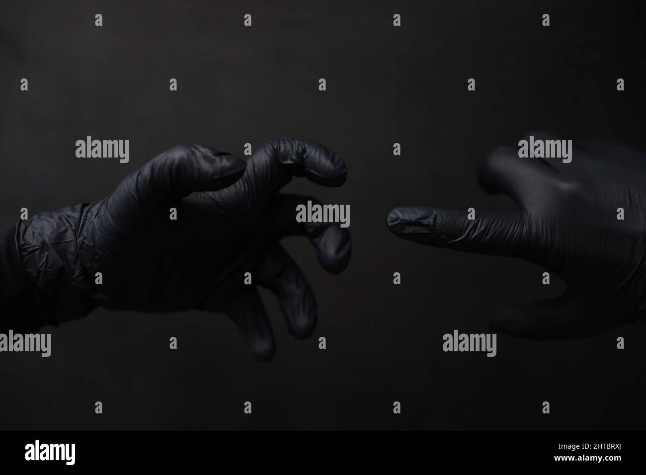 Background of hands in gloves. Black gloves. Hand gestures black gloves ...