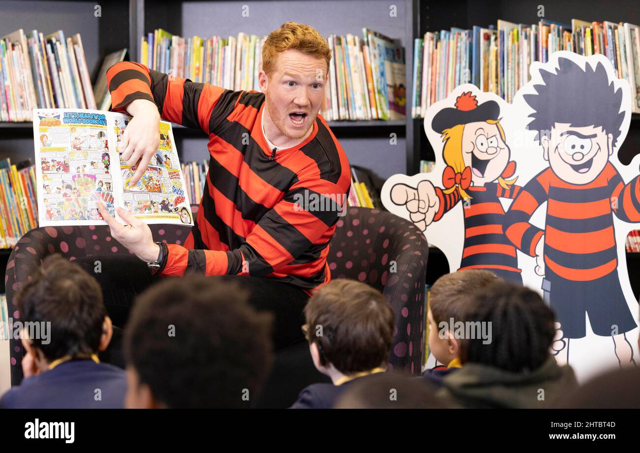 EDITORIAL USE ONLY Olympic Gold Medallist, Greg Rutherford reads from ...