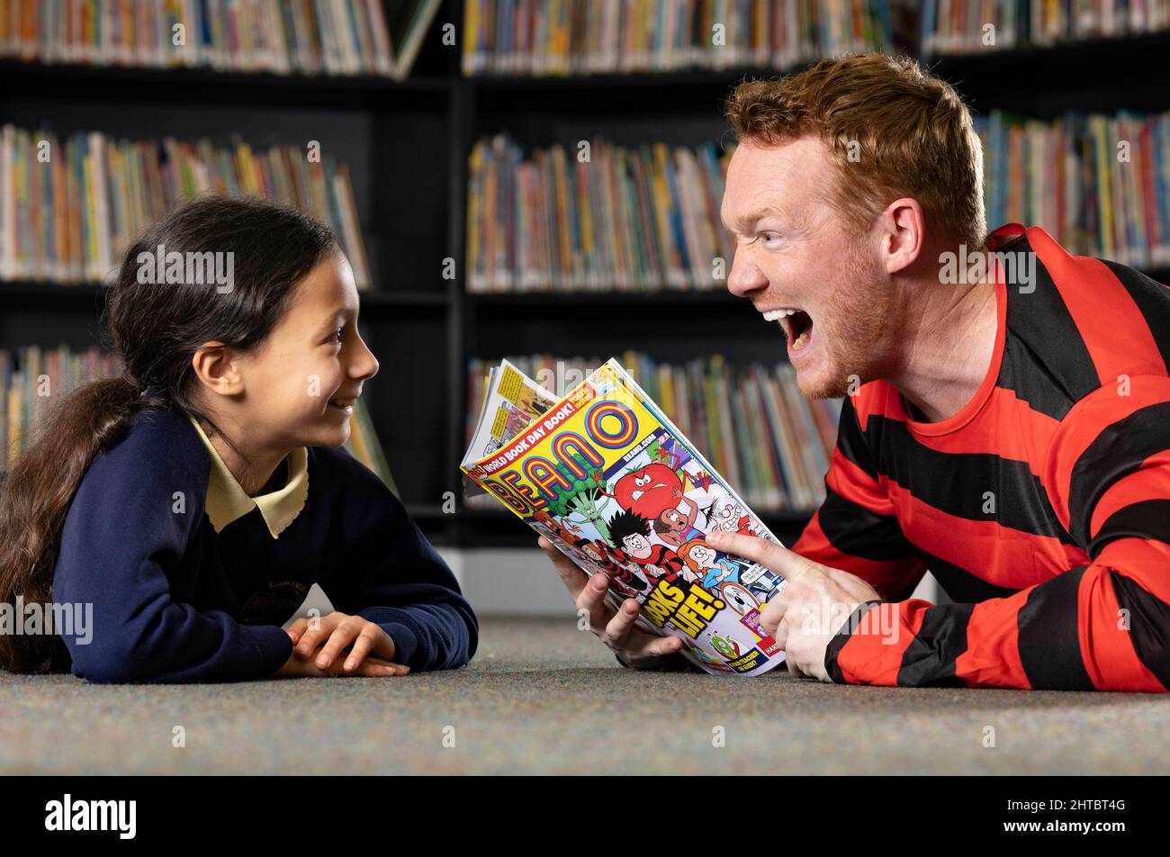 EDITORIAL USE ONLY Olympic Gold Medallist, Greg Rutherford reads from ...