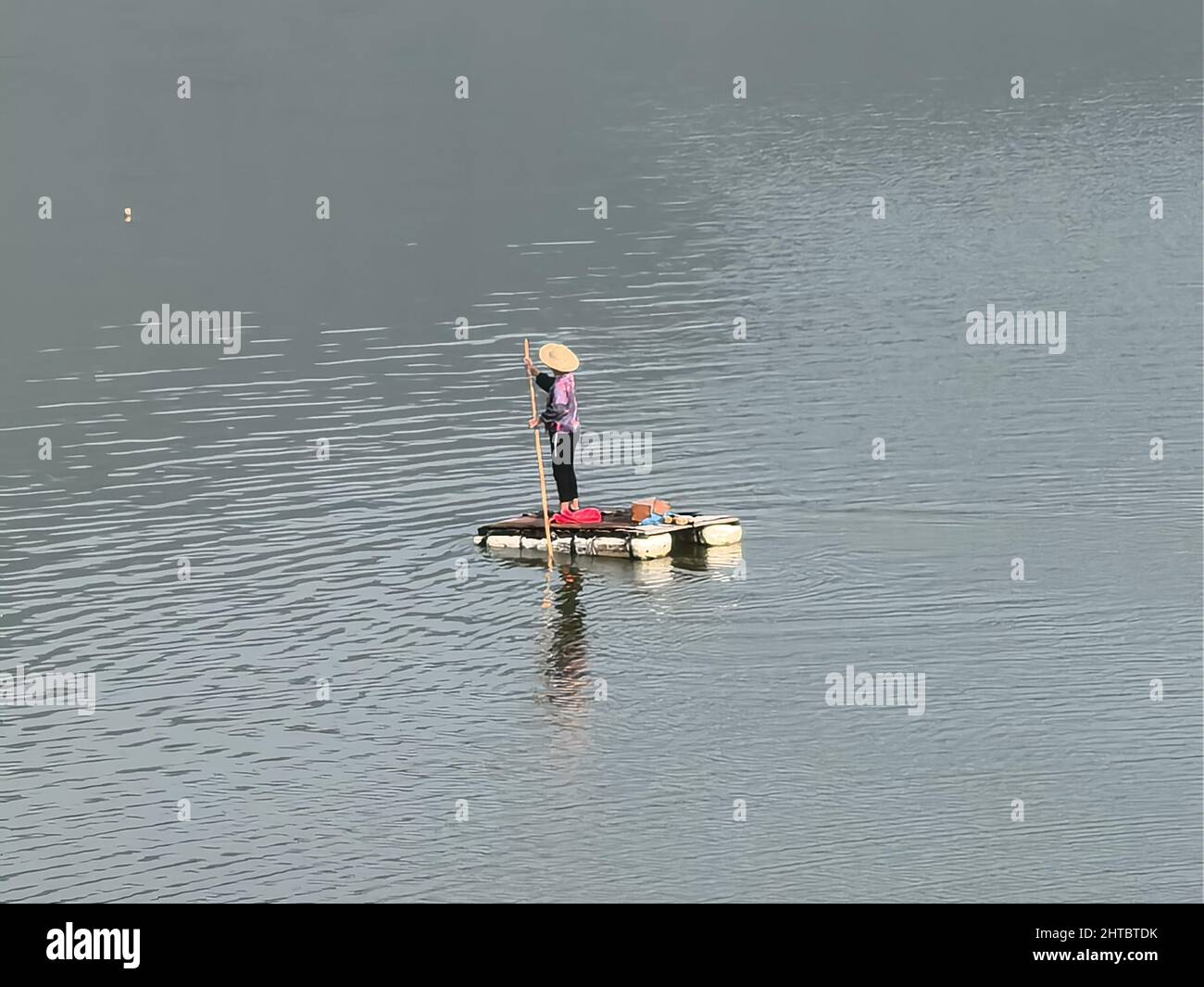 View of the male swimming on the river Stock Photo - Alamy