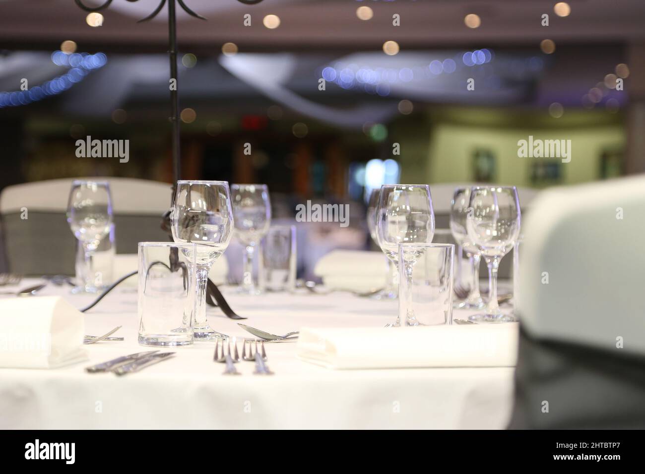 Minimalistic table prepared for an event Stock Photo - Alamy