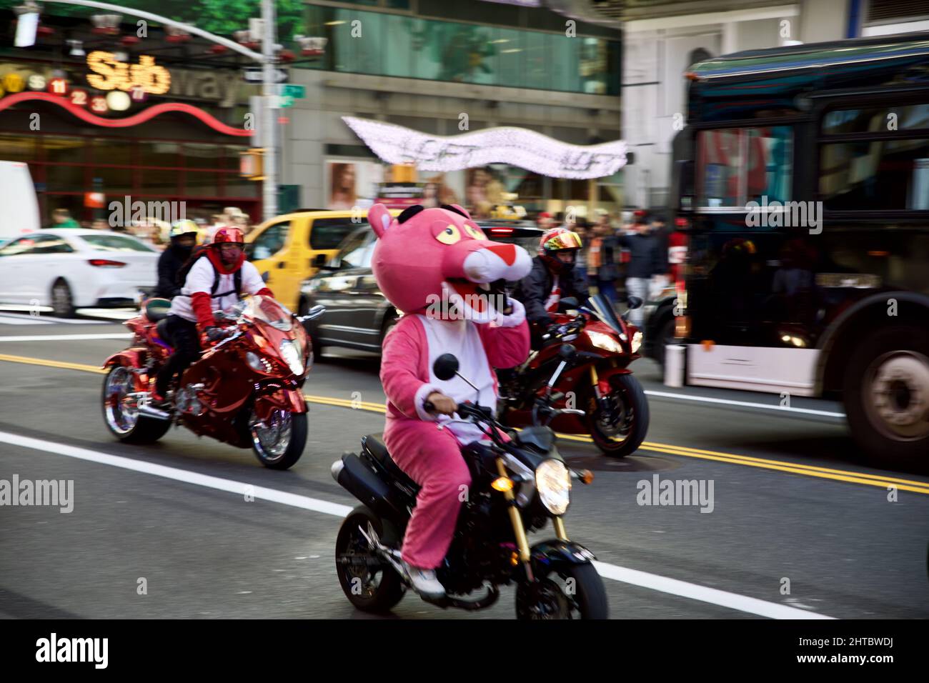 Closeup shot of a Pick Panther riding a motorcycle in New York City ...