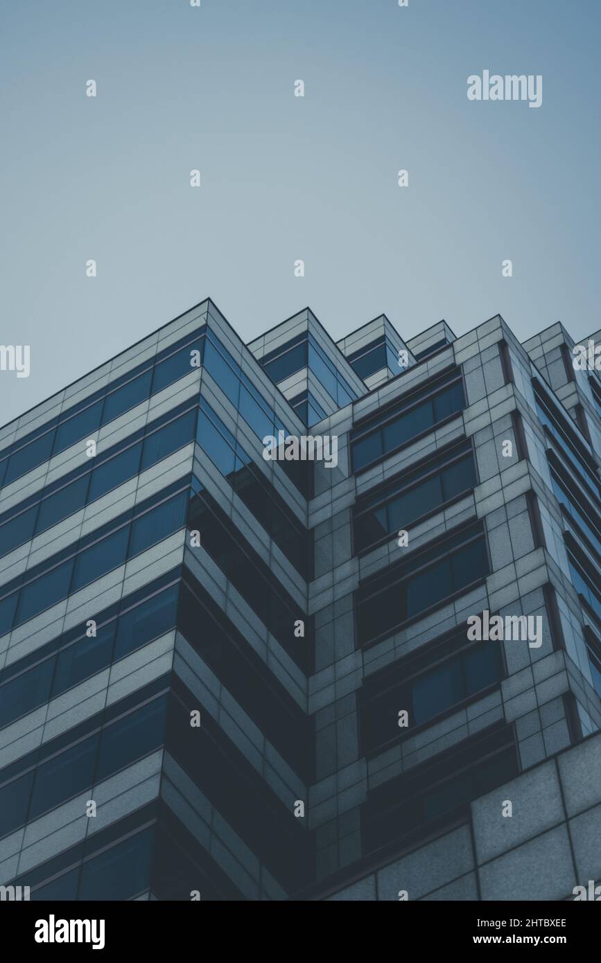 Vertical bottom shot of a building perspective in the evening Stock ...