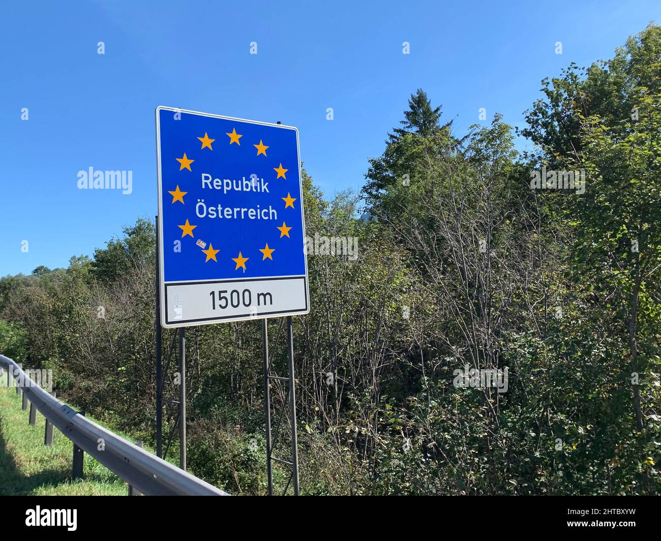 Highway sign in the border of Germany-Austria Stock Photo - Alamy