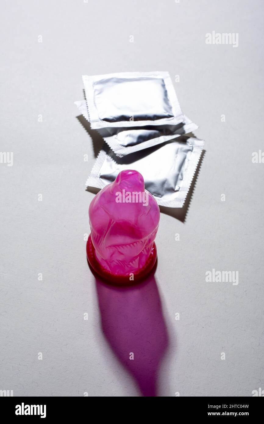 Closeup of a pink condom Stock Photo - Alamy