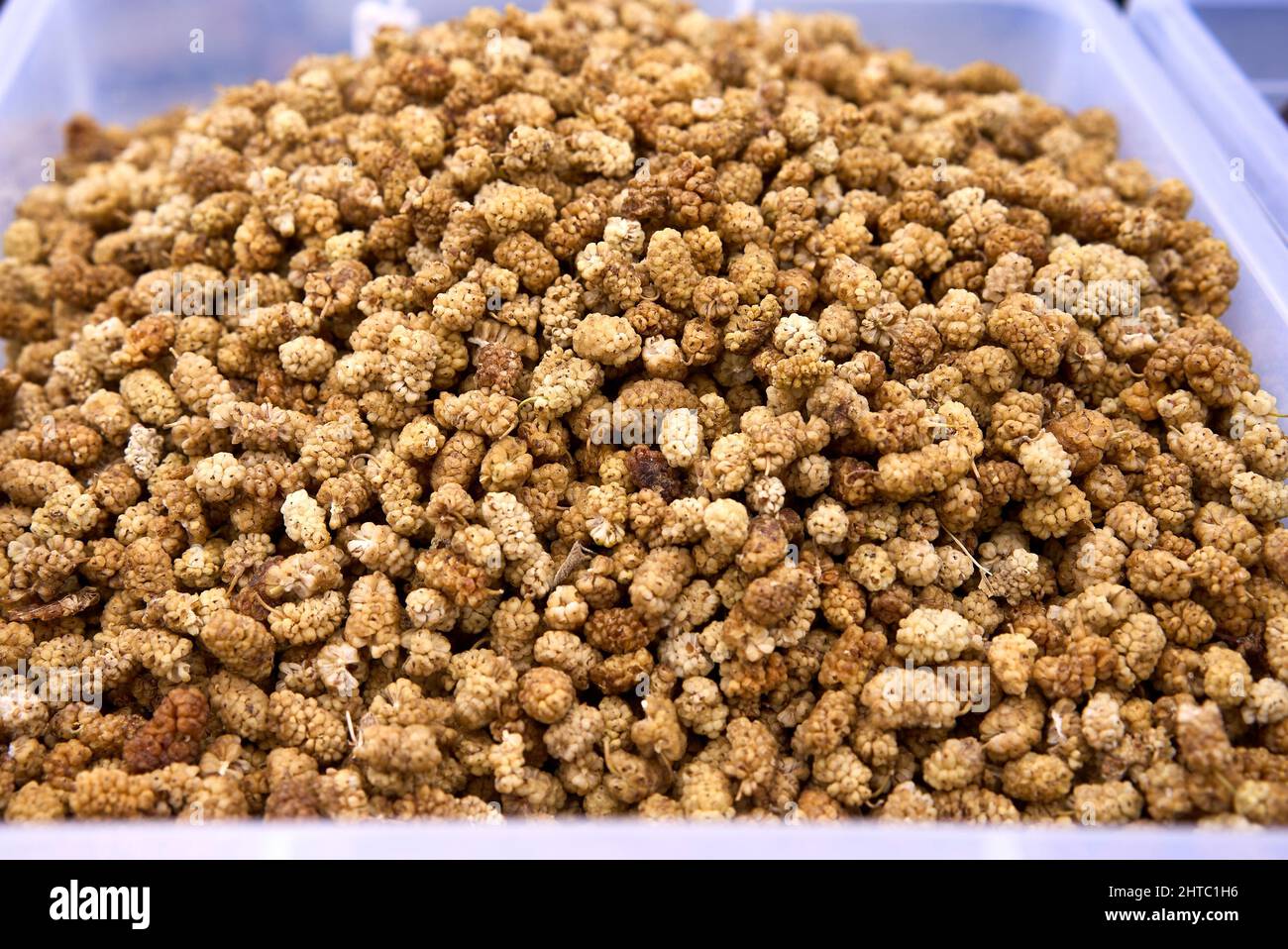Dried white mulberries on a farmers market stall in the Aegean coastal ...