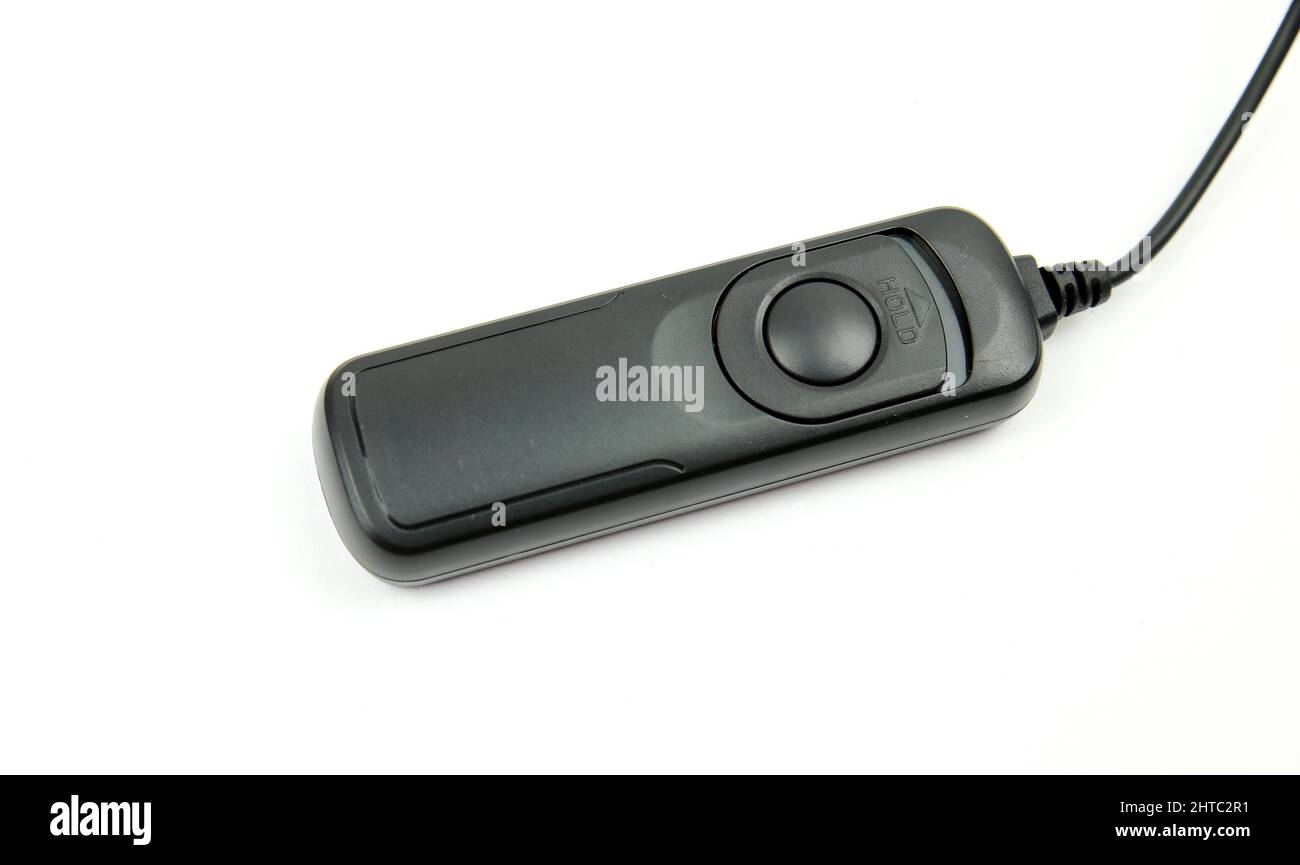 Black remote shutter release on white background Stock Photo - Alamy