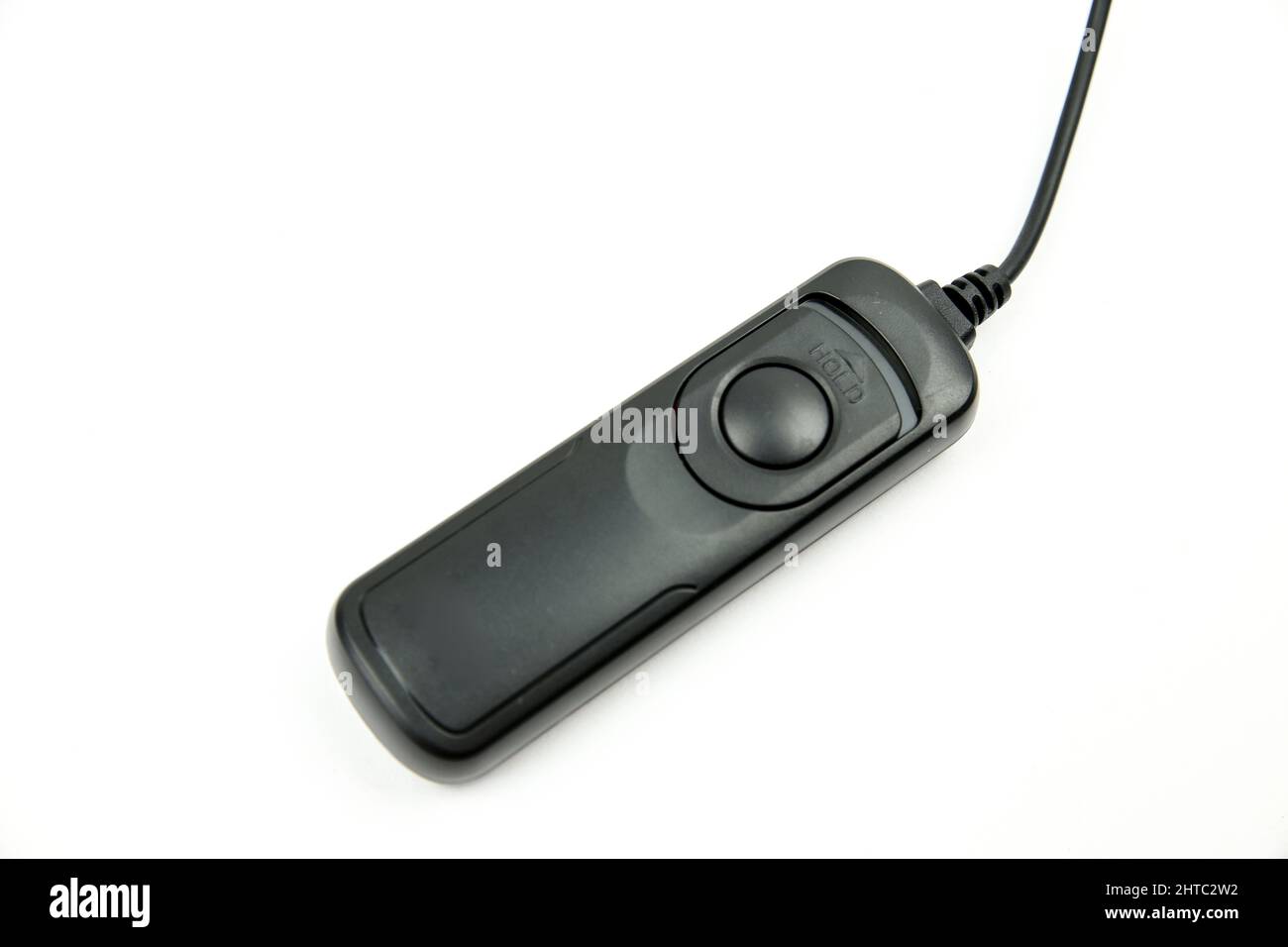 Black remote shutter release on white background Stock Photo - Alamy