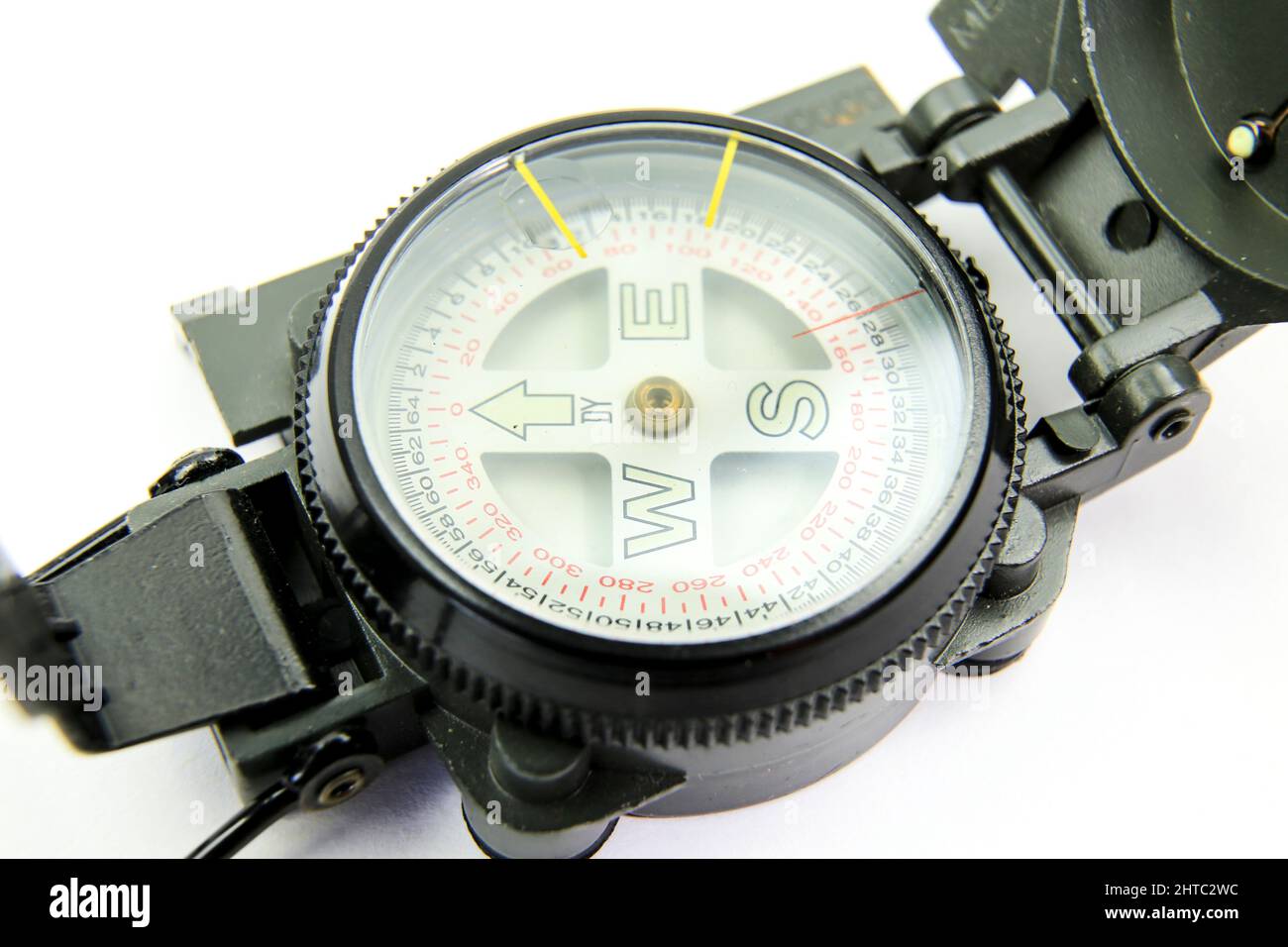 Nice Military green compass on white background Stock Photo - Alamy