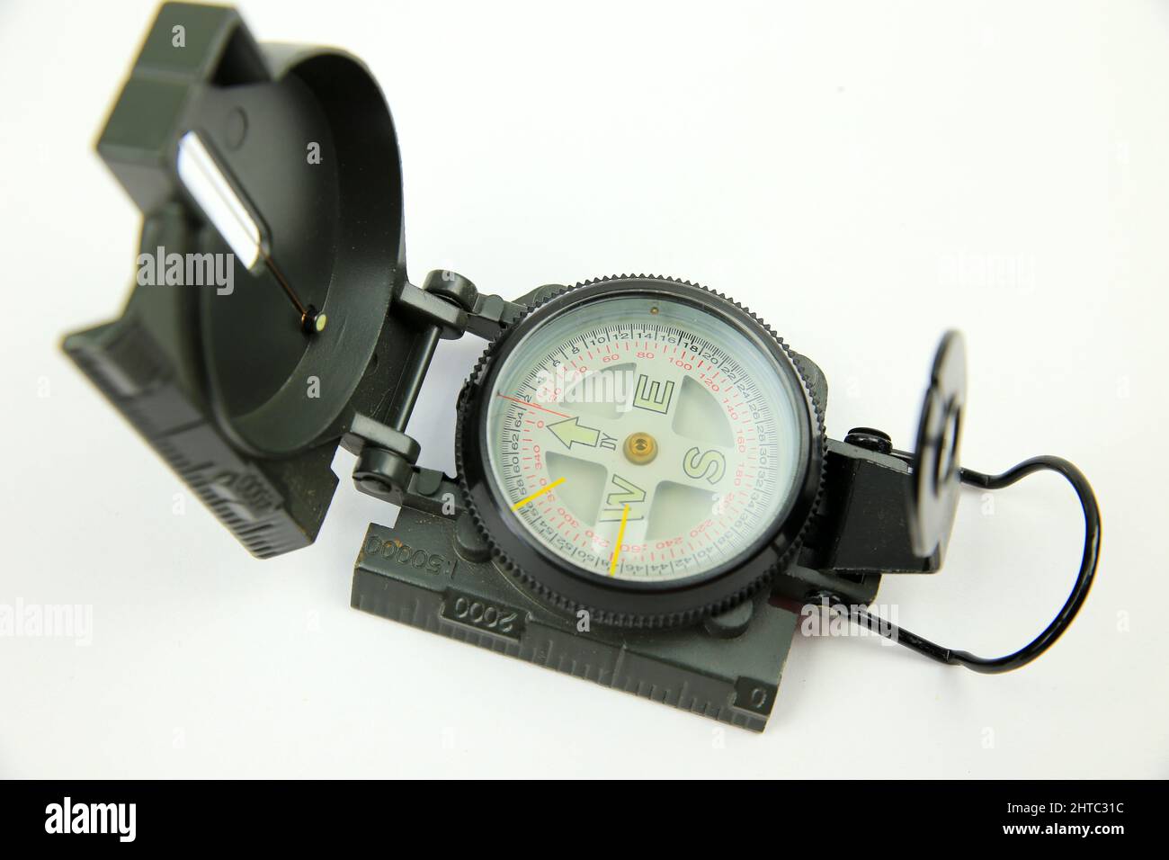 Nice Military green compass on white background Stock Photo - Alamy